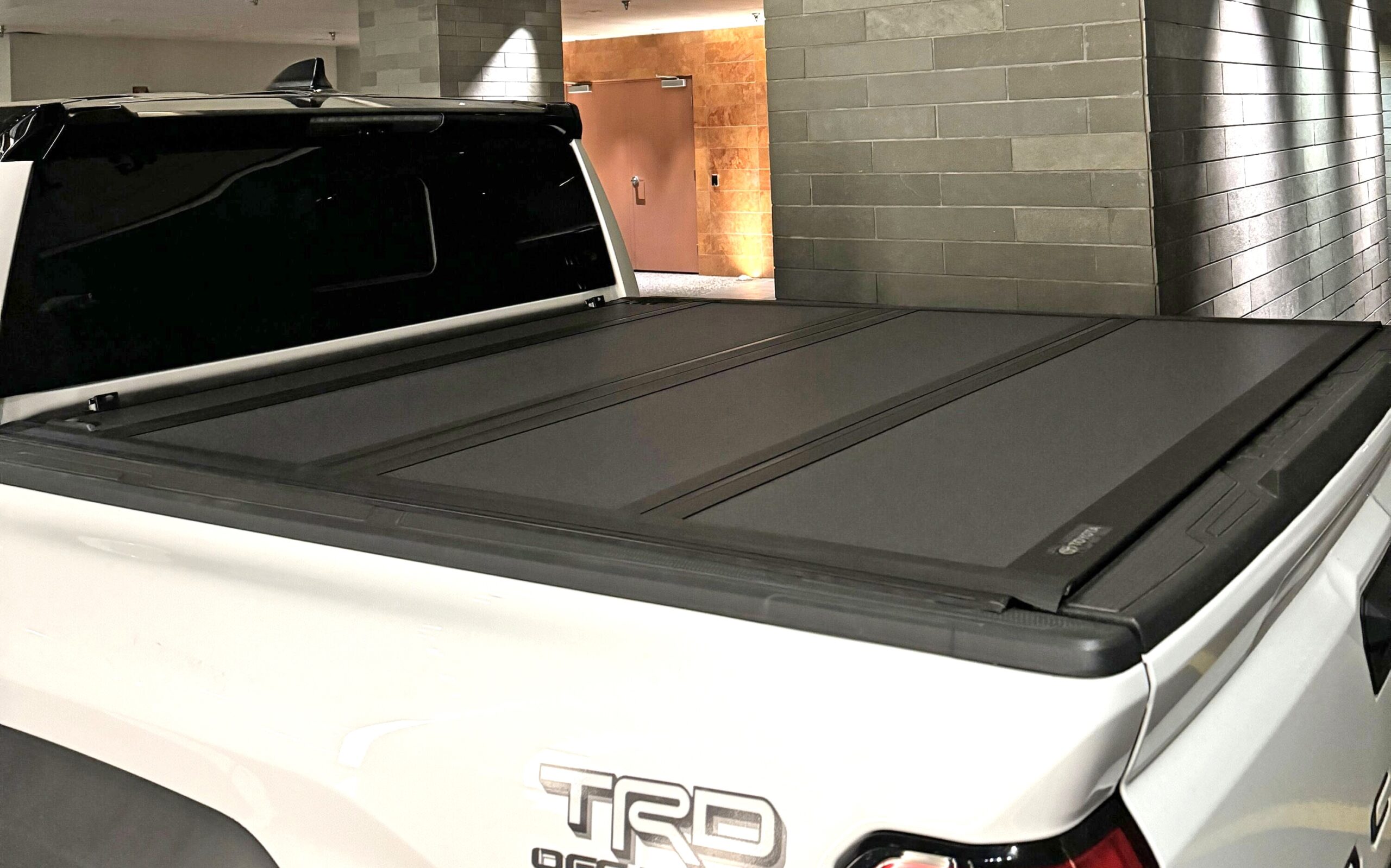 OEM Trifold Hard Tonneau Cover PT954-35240 installed on 2024 Tacoma ...